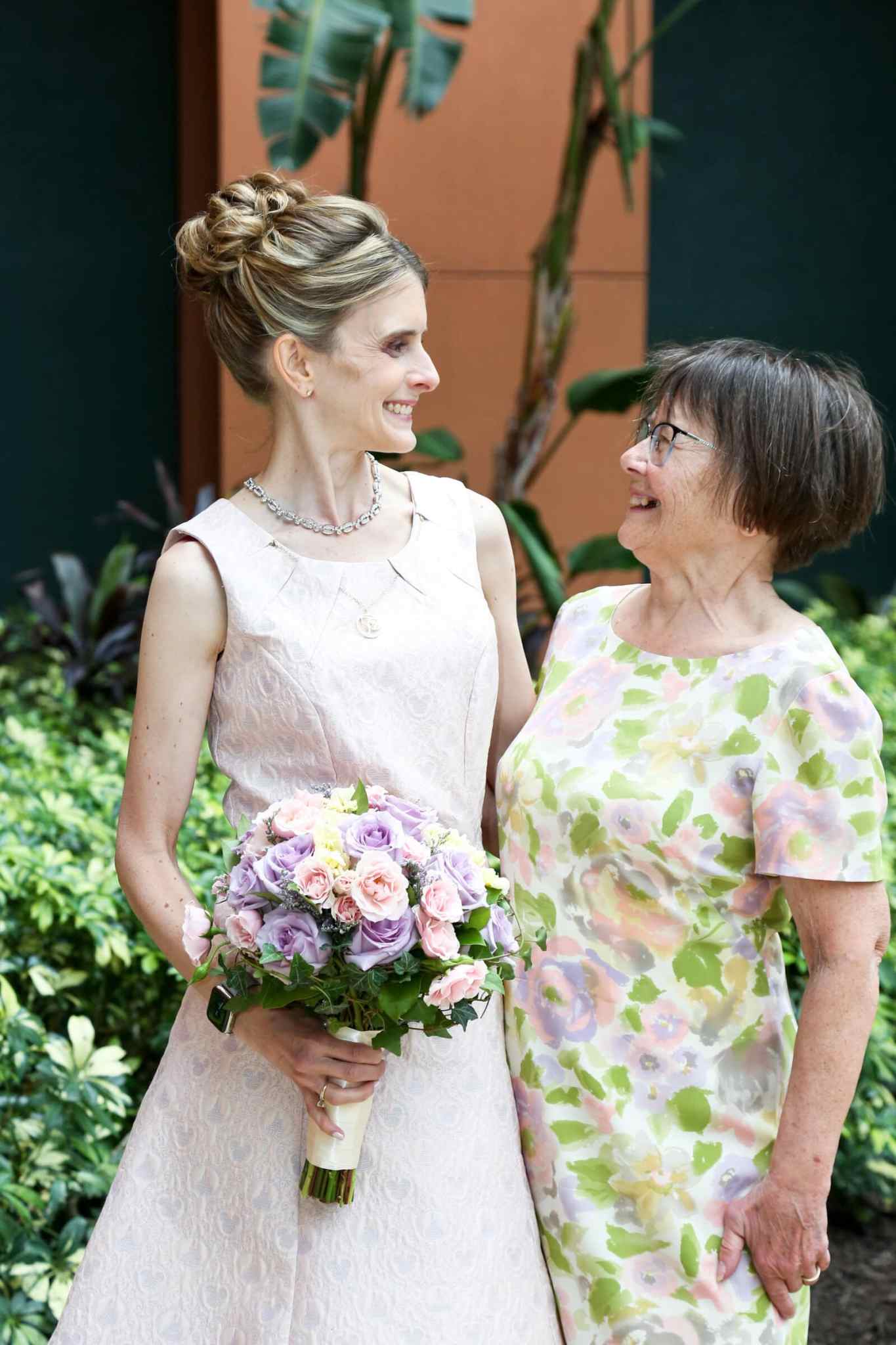 Vow Renewal Ceremony Ideas | Regina and Jason at the WDW Swan and ...